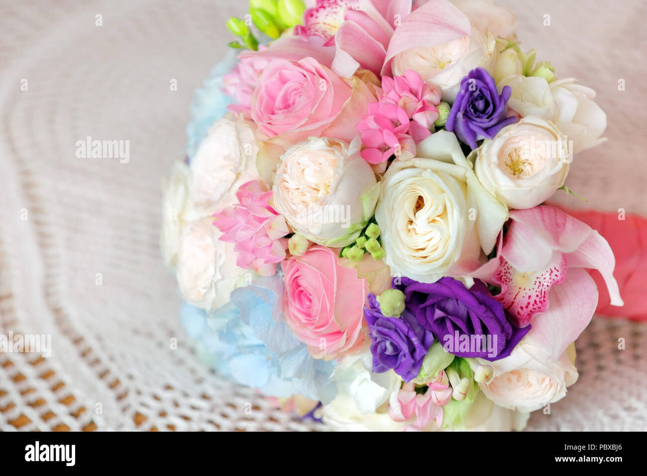 Wedding bouquet of pastel roses Stock Photo - Alamy