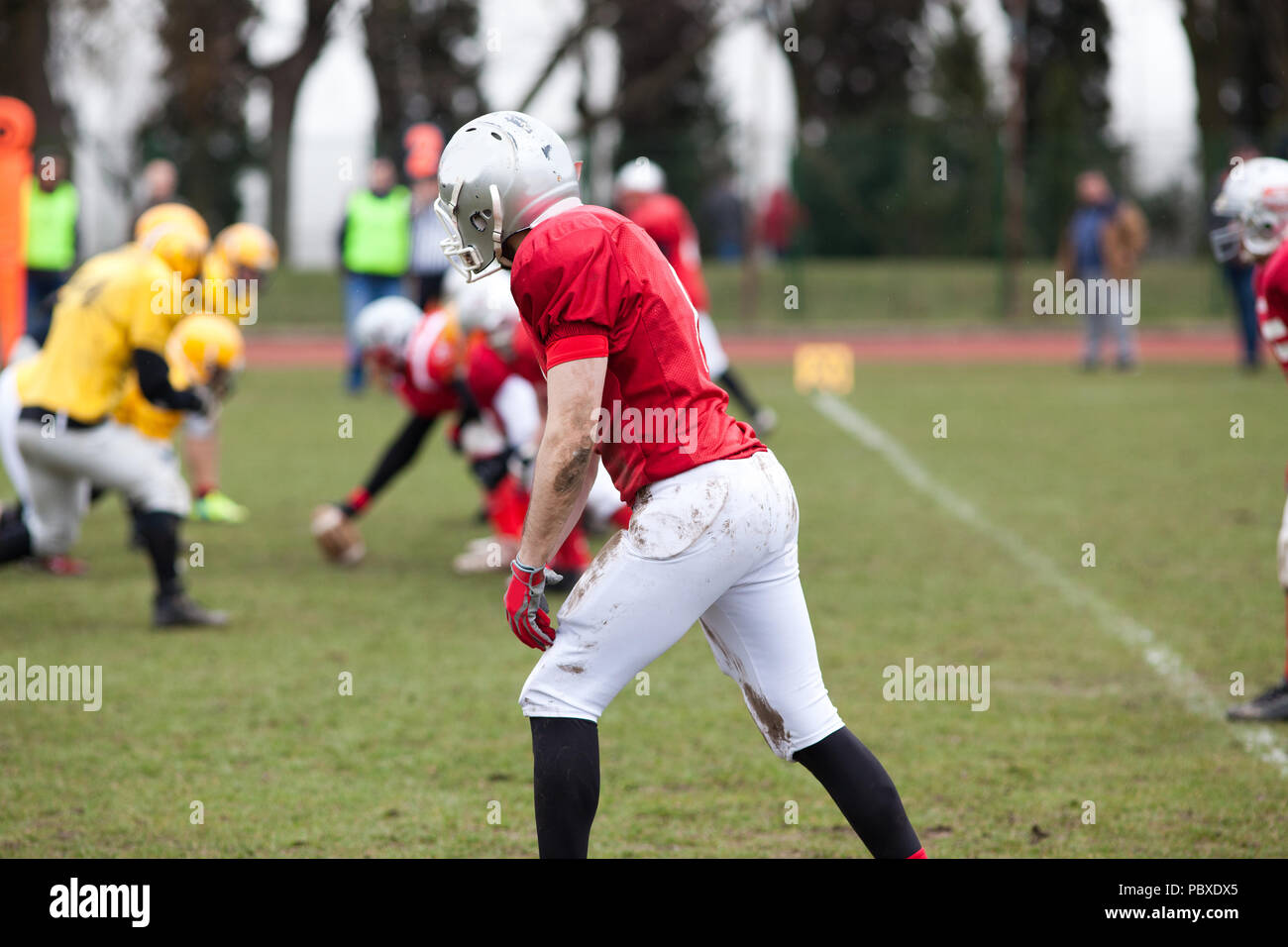 College football player fight hi-res stock photography and images - Alamy