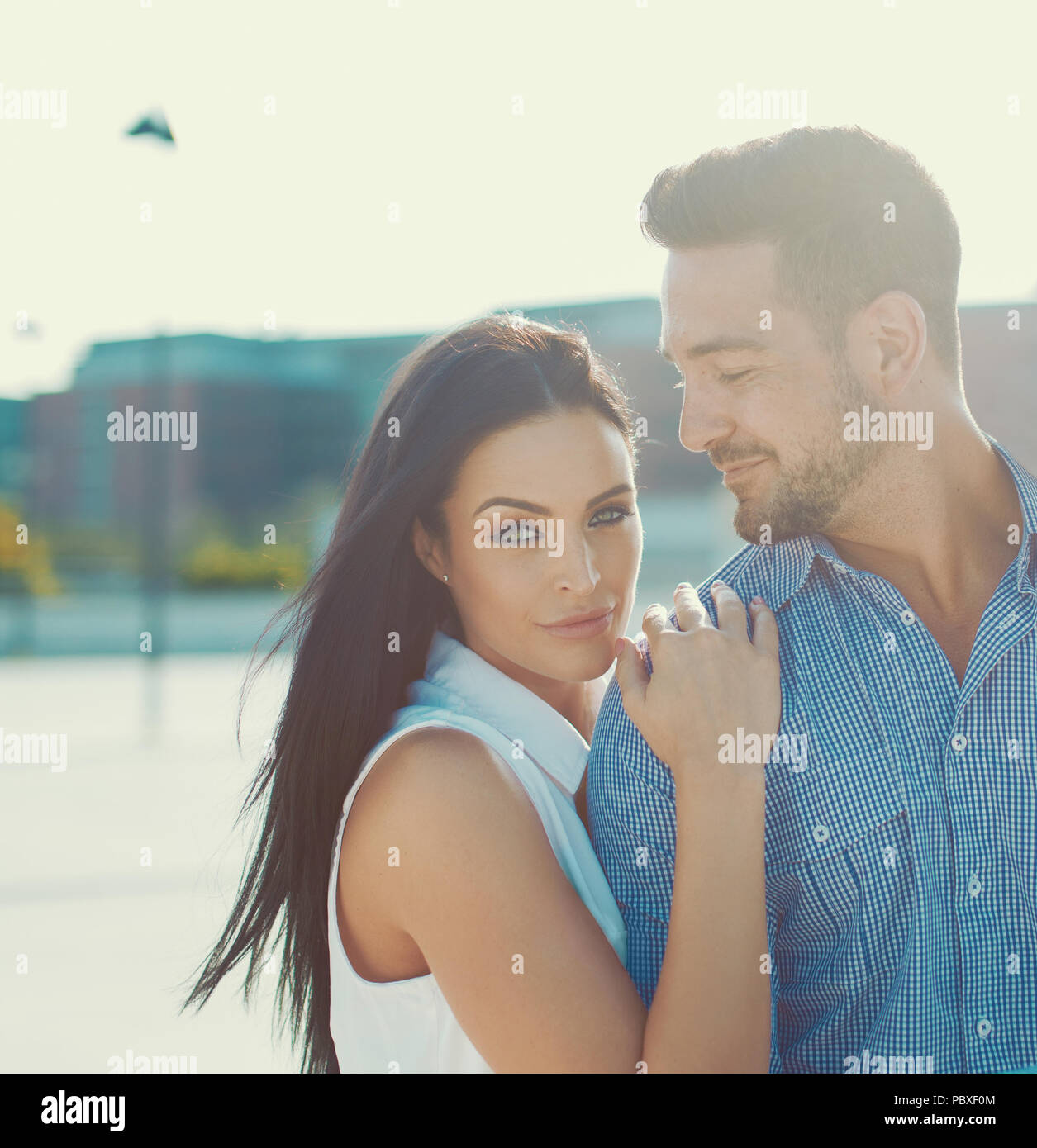 Young confident woman in relationship with man, outdoors portrait Stock ...