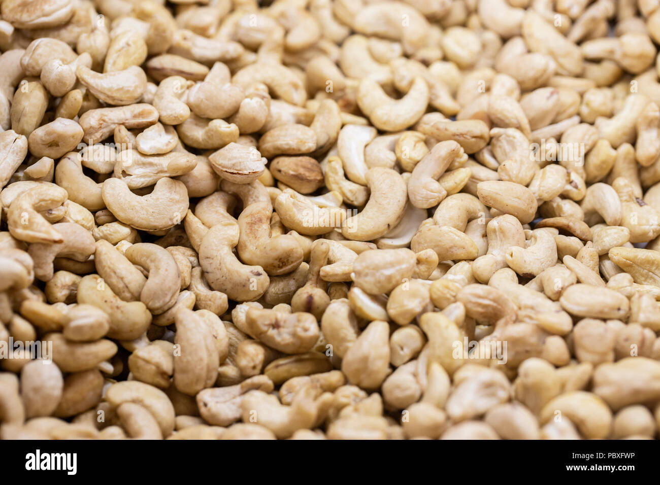 Cashews nut background Selected focus Stock Photo - Alamy