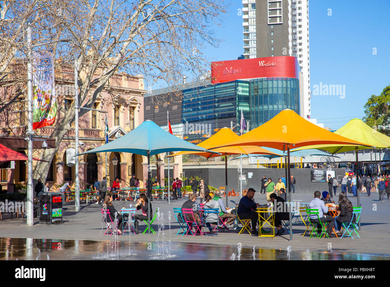 Centenary square in Parramatta city centre with people enjoying lunch ...