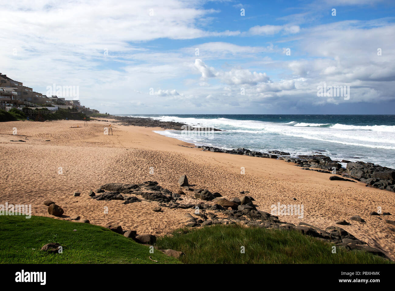 Sandy beach, surf and blue sky at Ballito a holiday town located in ...