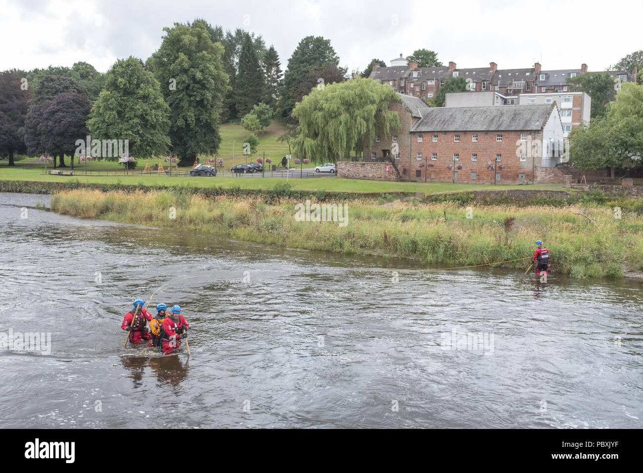 At the Whitesands HM Search and Rescue carefully cross the River Nith ...