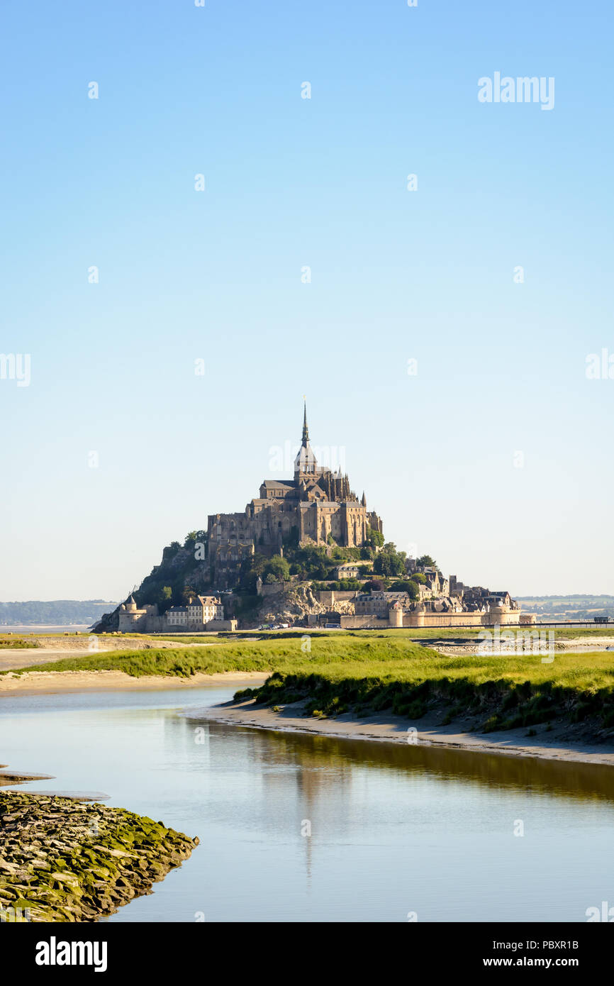 The Mont Saint-Michel tidal island, located in France in Normandy, at ...