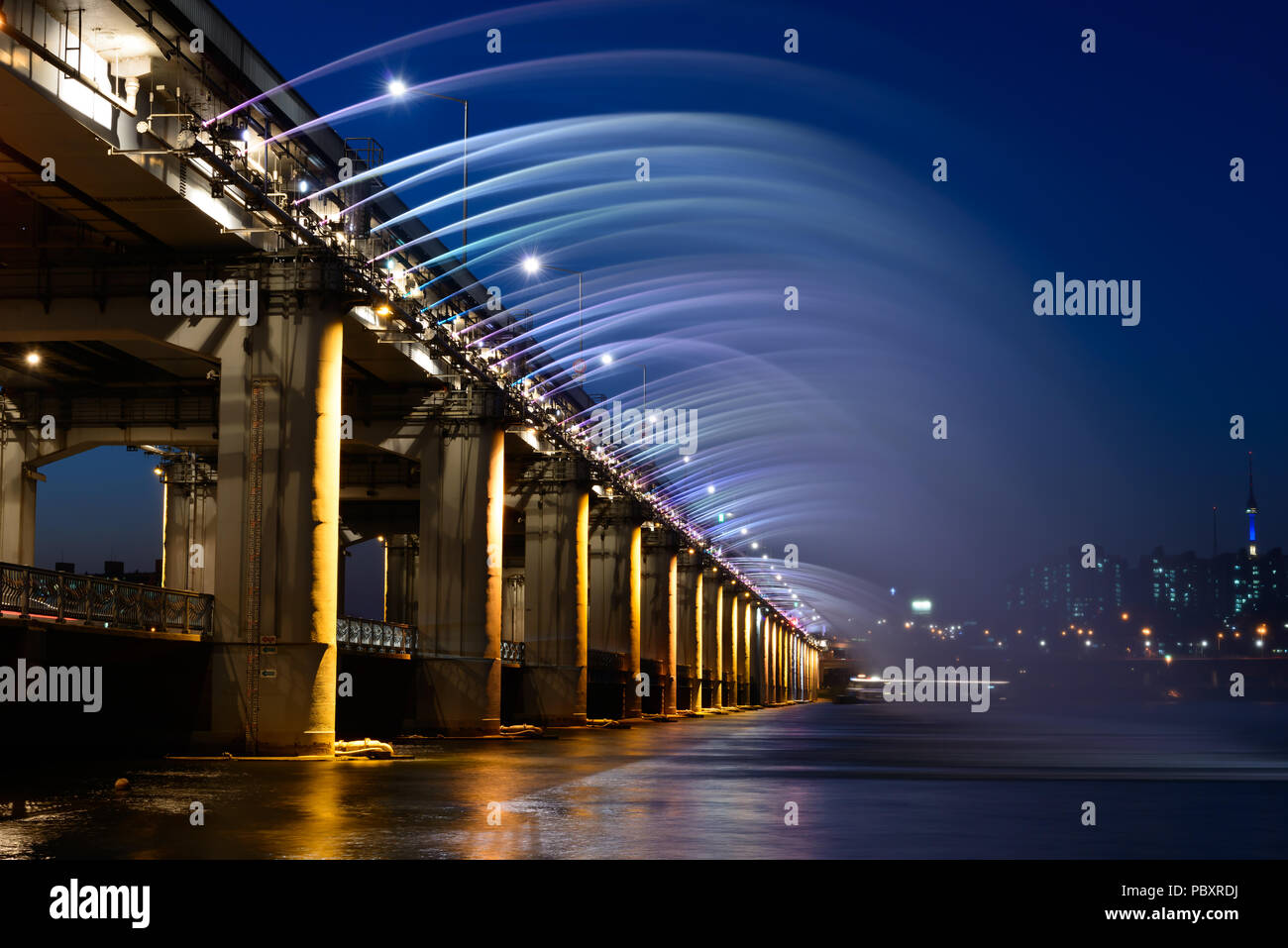 The South Korean bridge fountain at night Stock Photo - Alamy