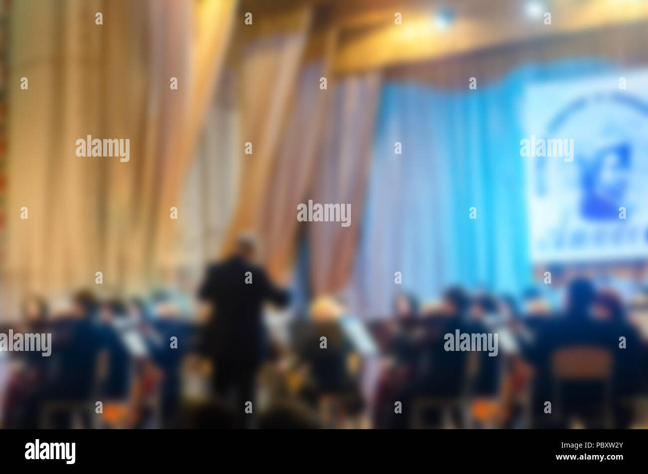 Orchestra conductor manages the orchestra. musical concept. blurred ...