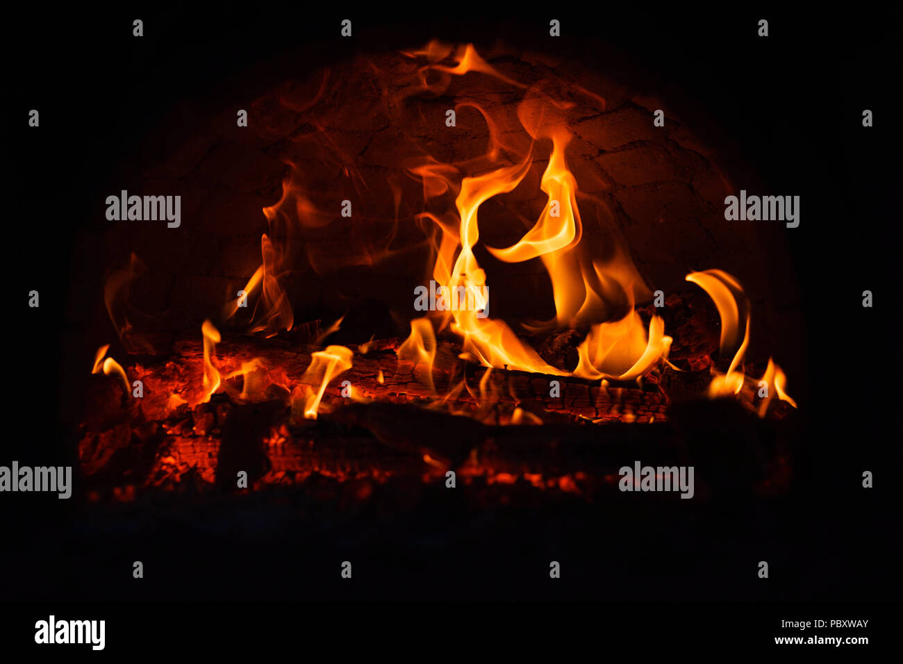 Fire burning in the night Stock Photo - Alamy
