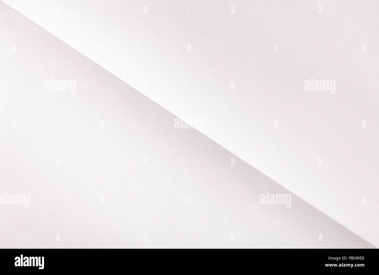 white sheet of paper folded in one, textured Stock Photo - Alamy