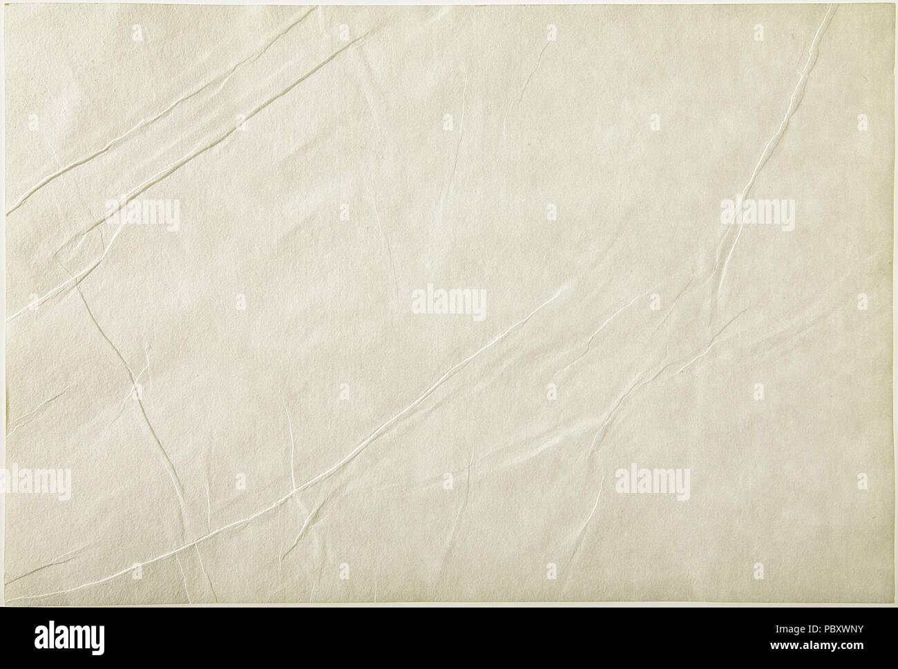 Old sheet of paper folded and battered, with paper texture Stock Photo ...