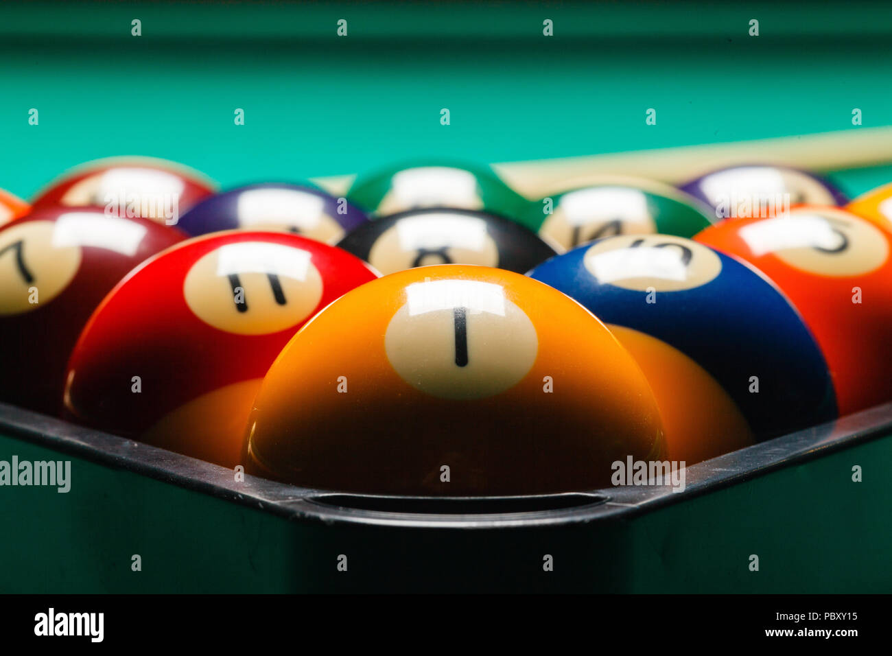 Billiard balls in a pool table Stock Photo - Alamy