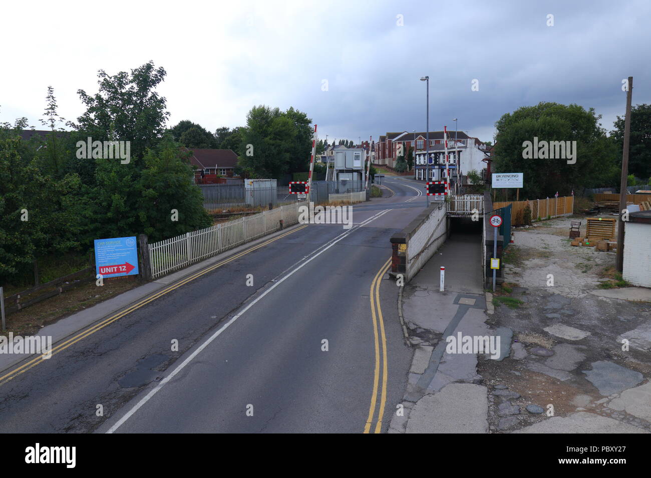 Open level crossing barriers hi-res stock photography and images - Alamy