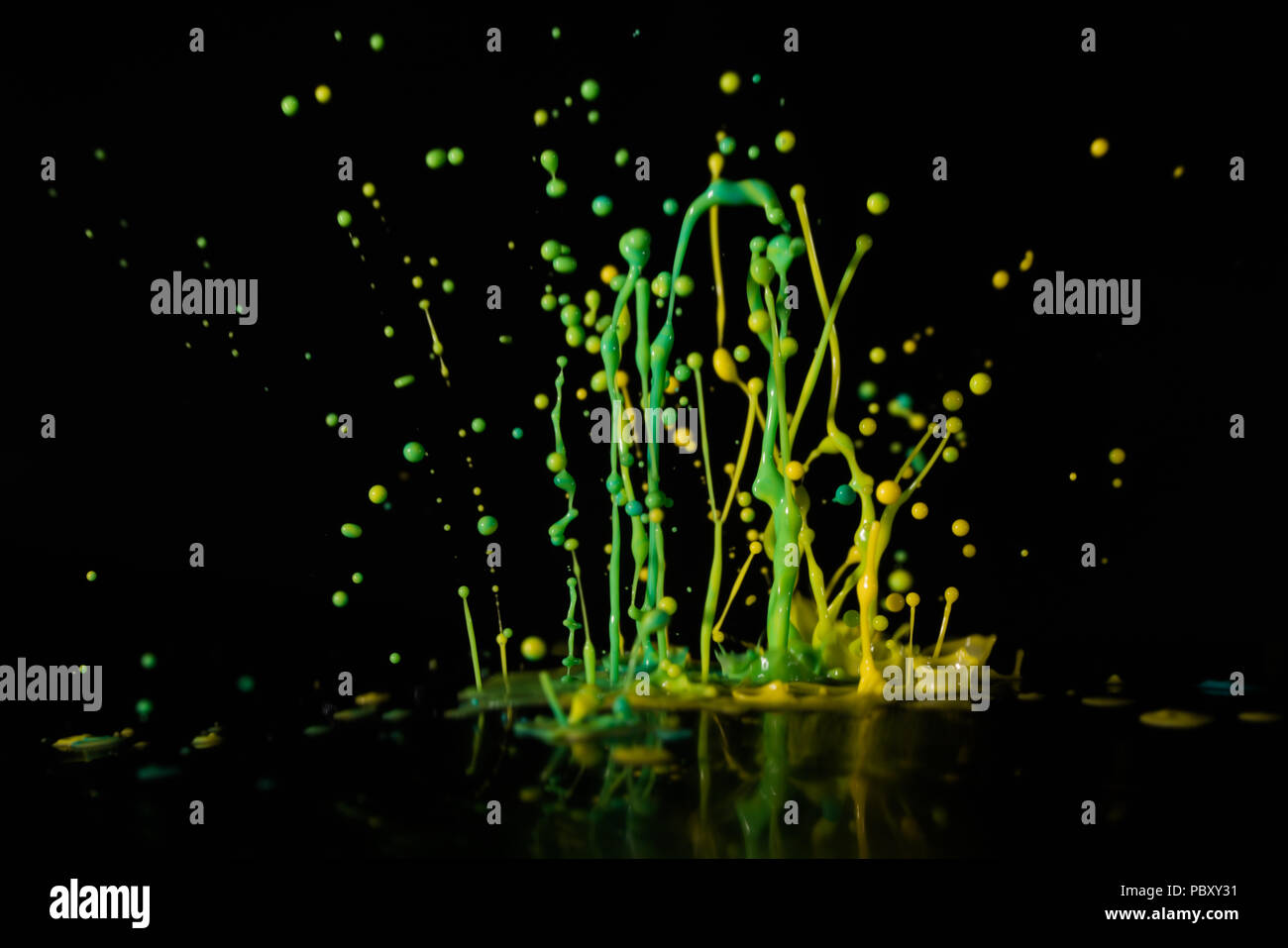 abstract color splash isolated on black background Stock Photo - Alamy