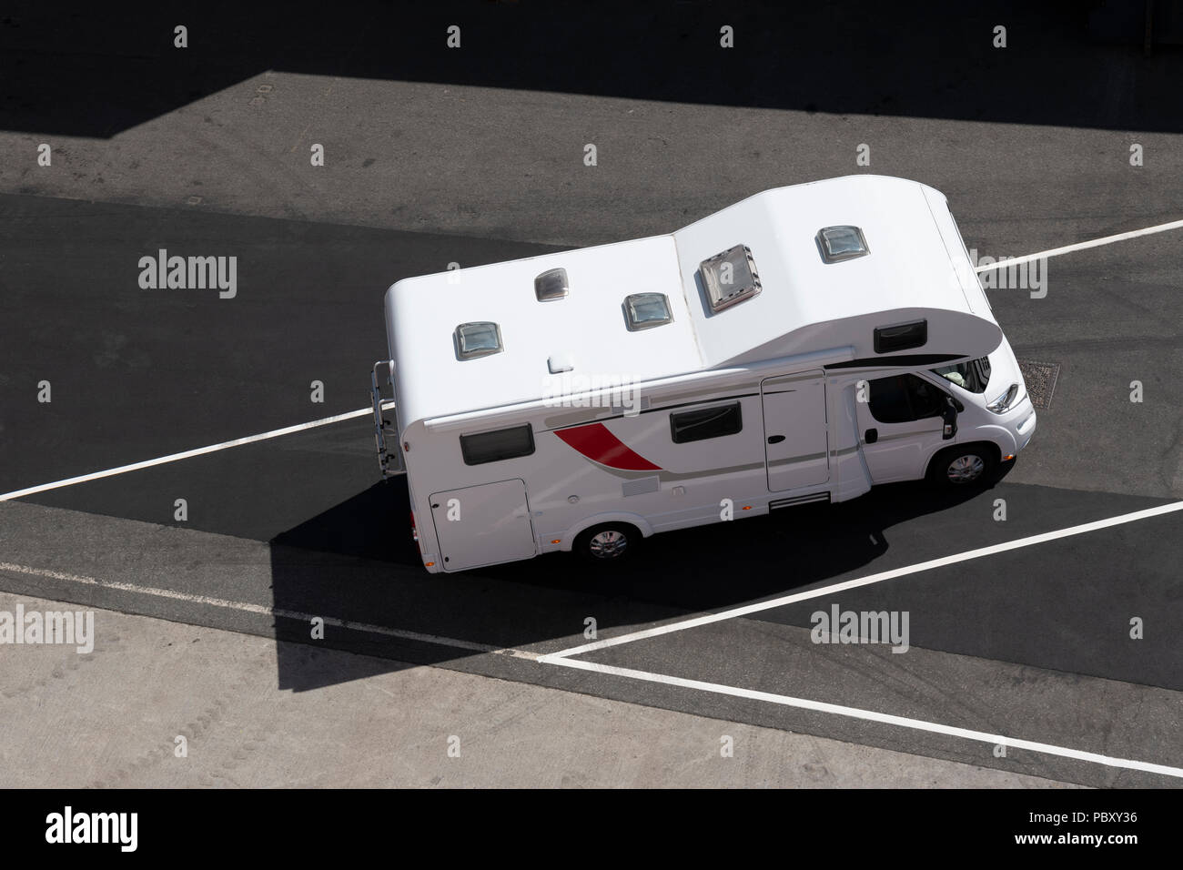 Aerial view of a motorhome roof driving on tarmac Stock Photo - Alamy