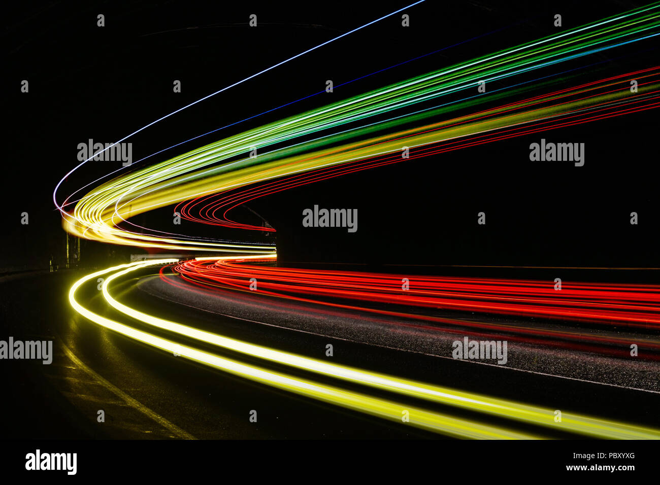 Light traillight trails in tunnel. Art image. Long exposure photo taken ...