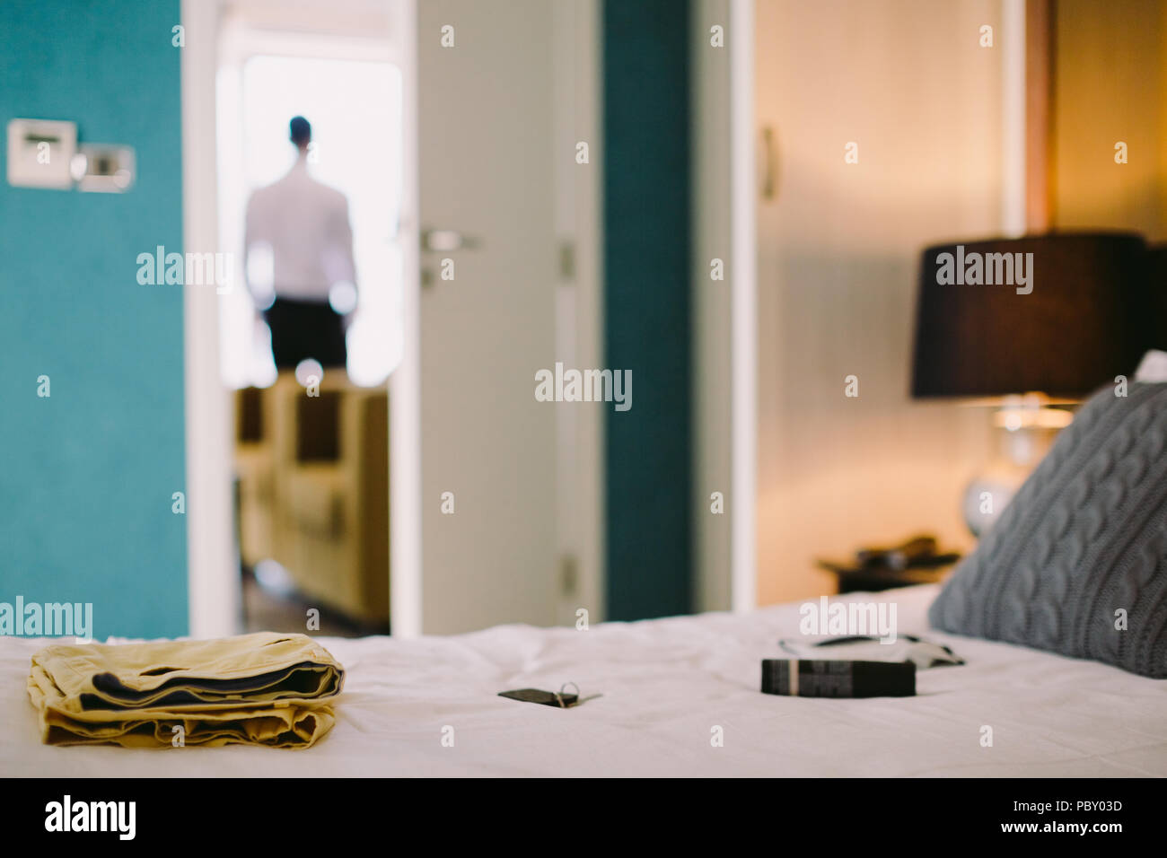Businessman getting dressed in hotel hi-res stock photography and ...
