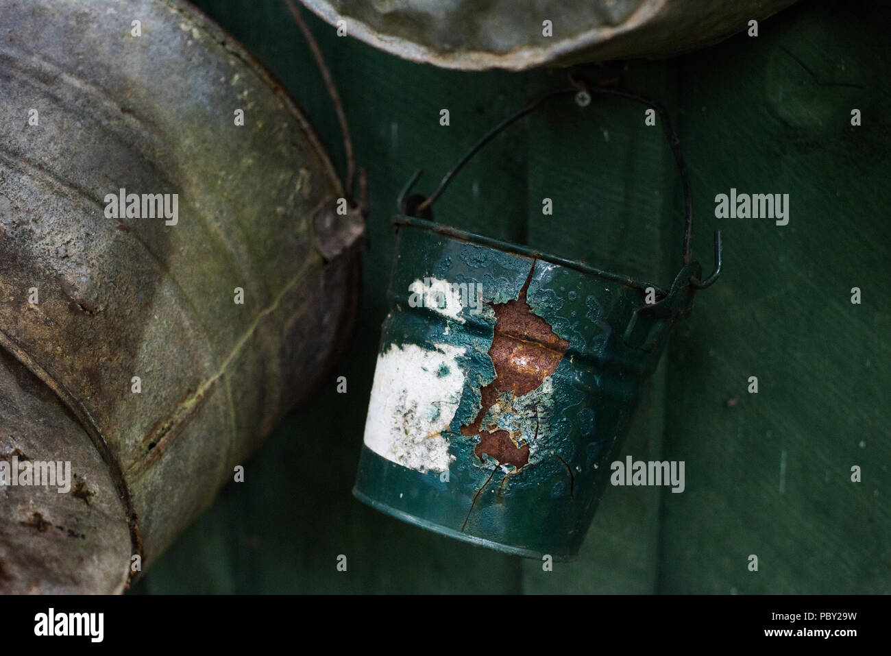 Rustic Rusty bucket Stock Photo - Alamy