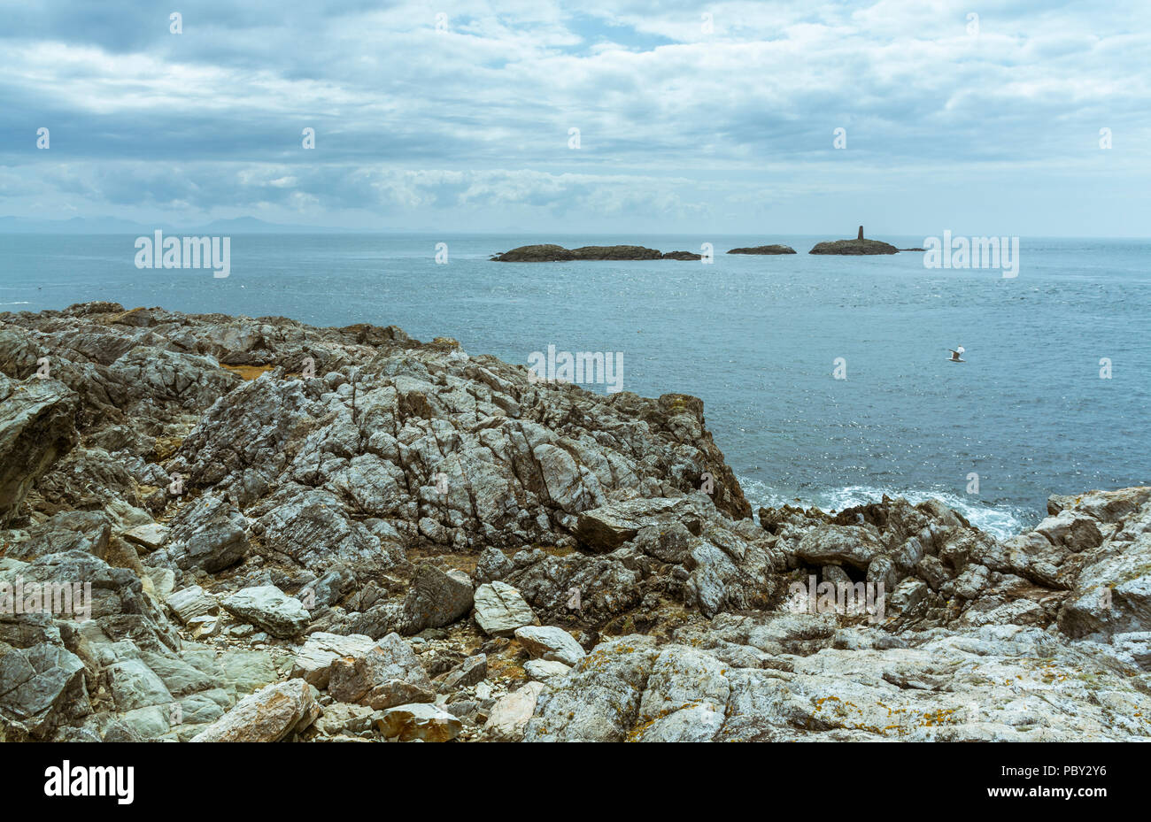 A view from around Rhoscolyn head on the Isle of Anglesey towards small ...