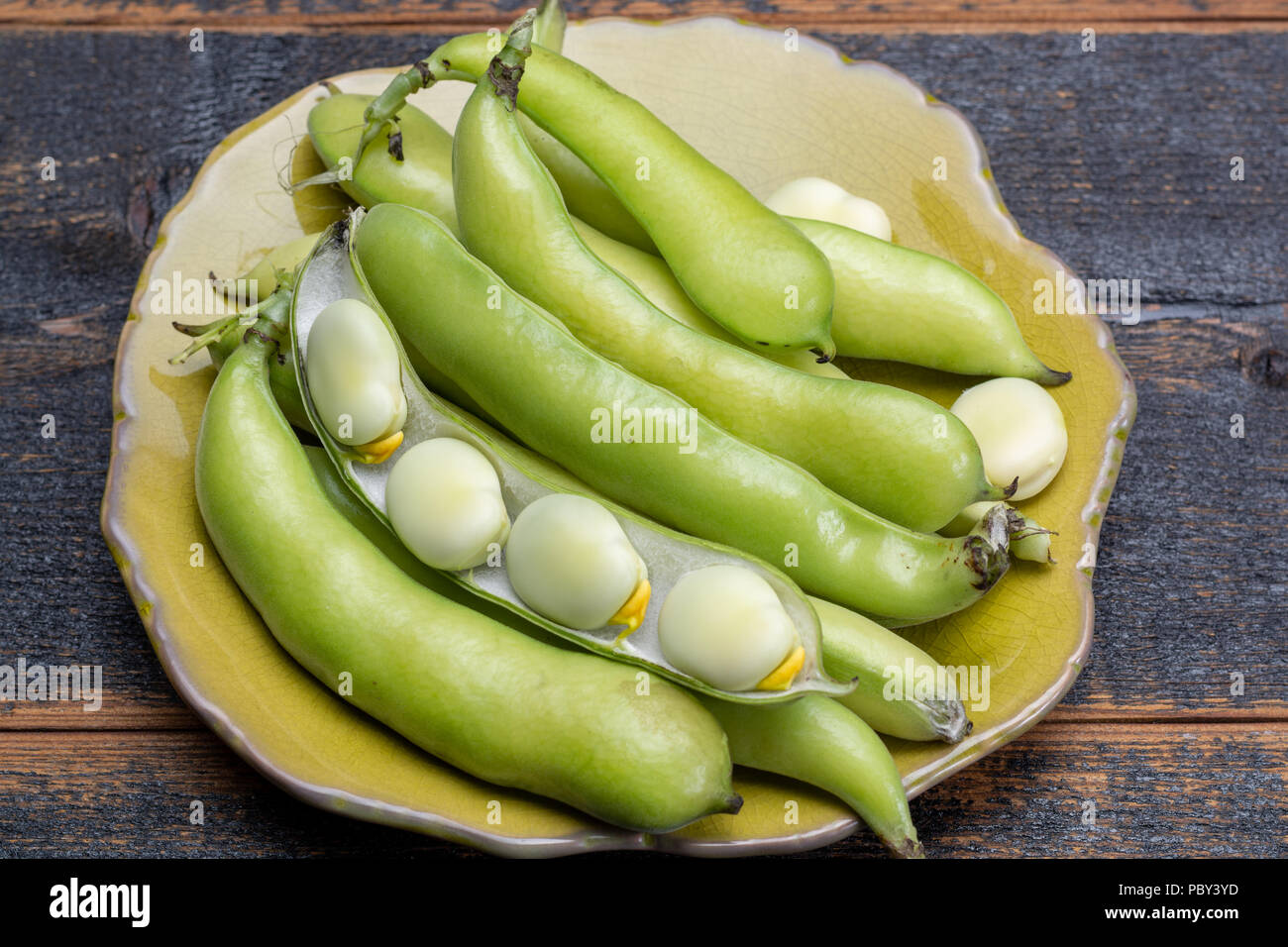 New harvest of healthy vegetables, green fresh raw big broad beans ...