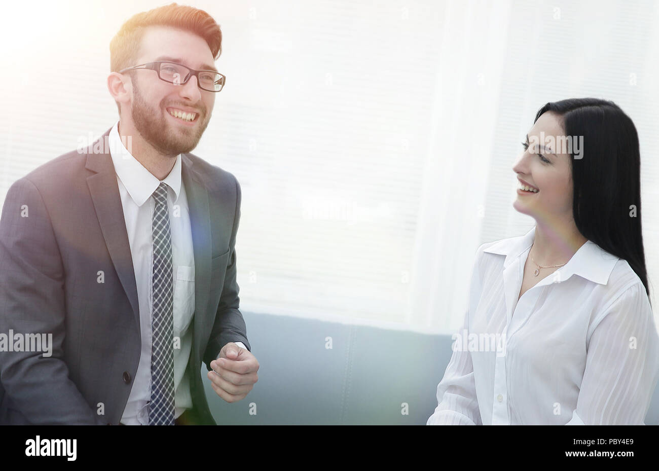 manager and customer talking in a modern office Stock Photo - Alamy