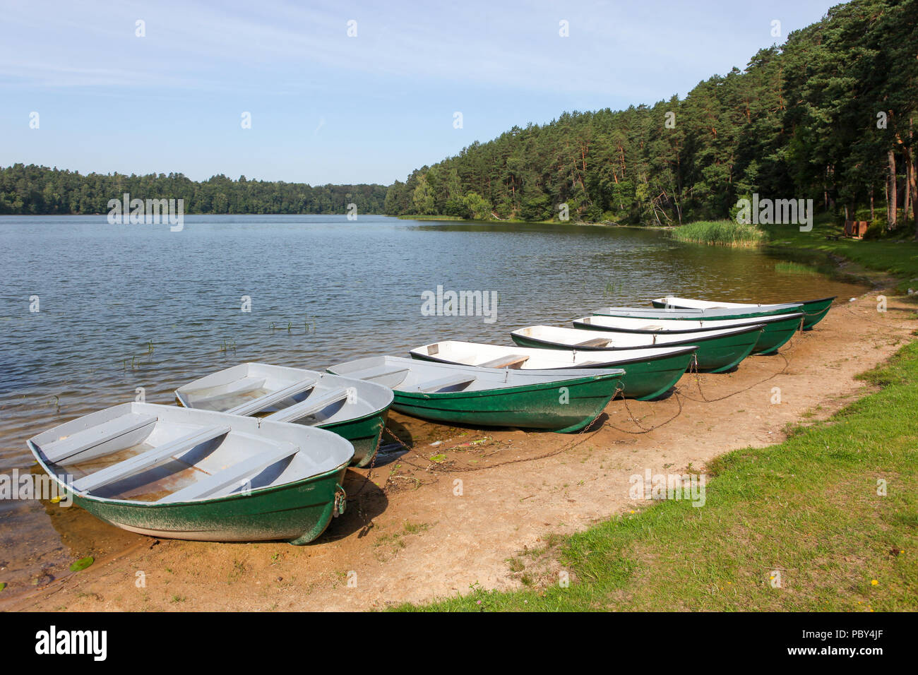 Boats on the beach at Lake Asveja or Dubingiai Lake, the longest lake ...