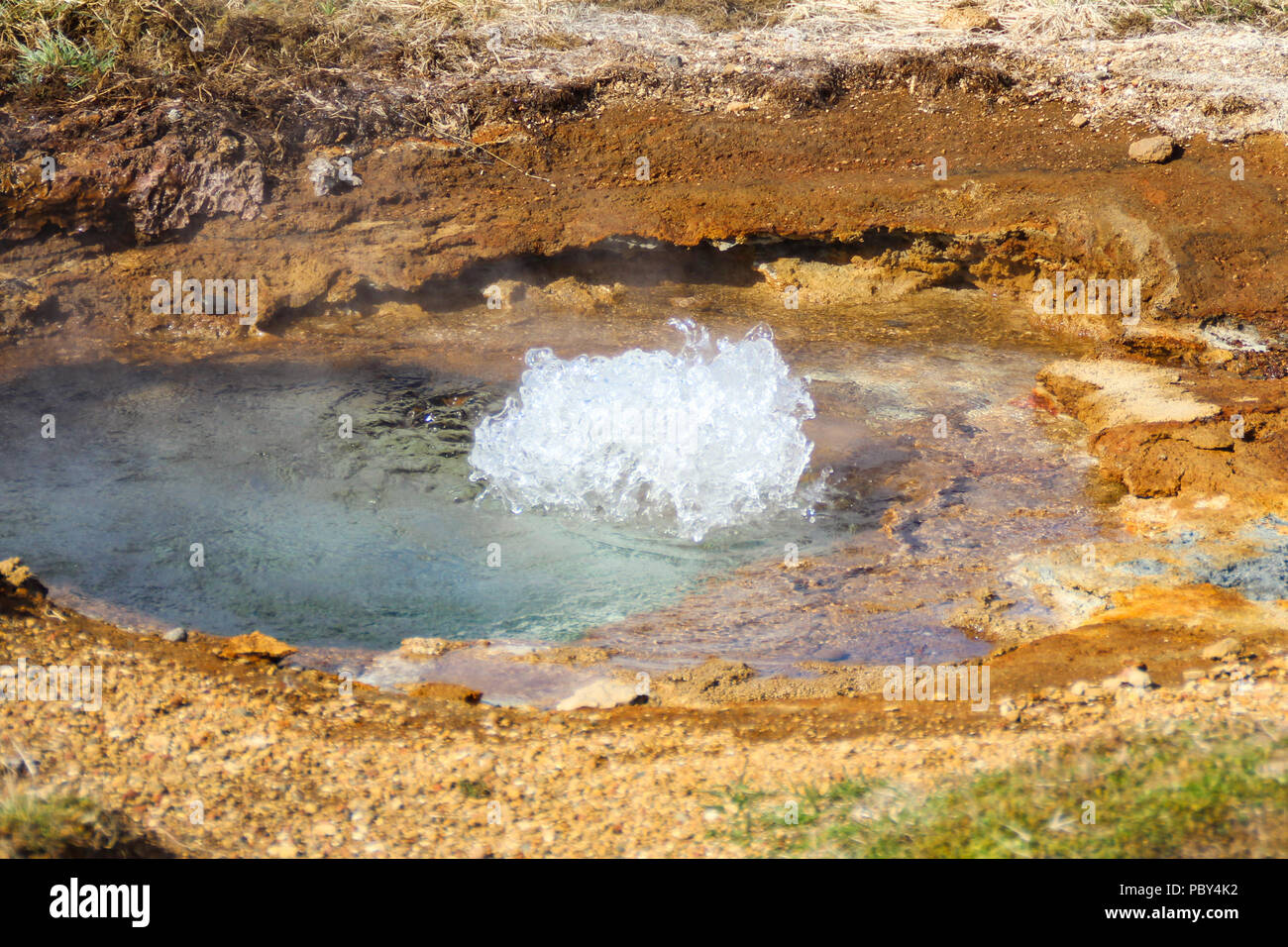 Strokkur geysir eruption at the Geysir geothermal Park on the Golden ...