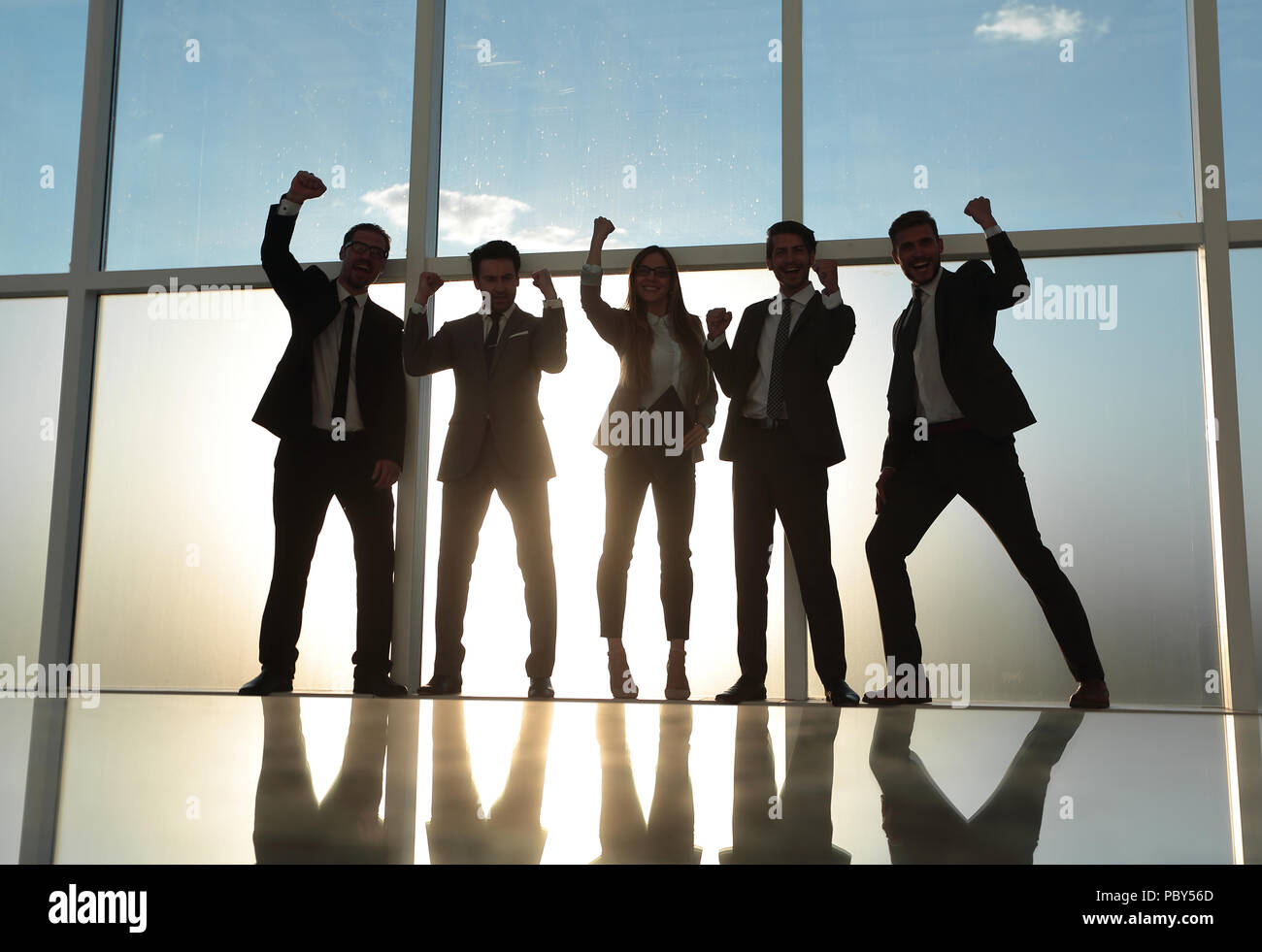 A group of people with great success holds Stock Photo - Alamy