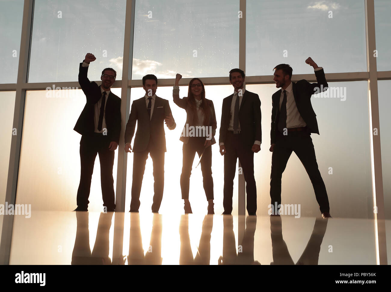 A group of people with great success holds Stock Photo - Alamy