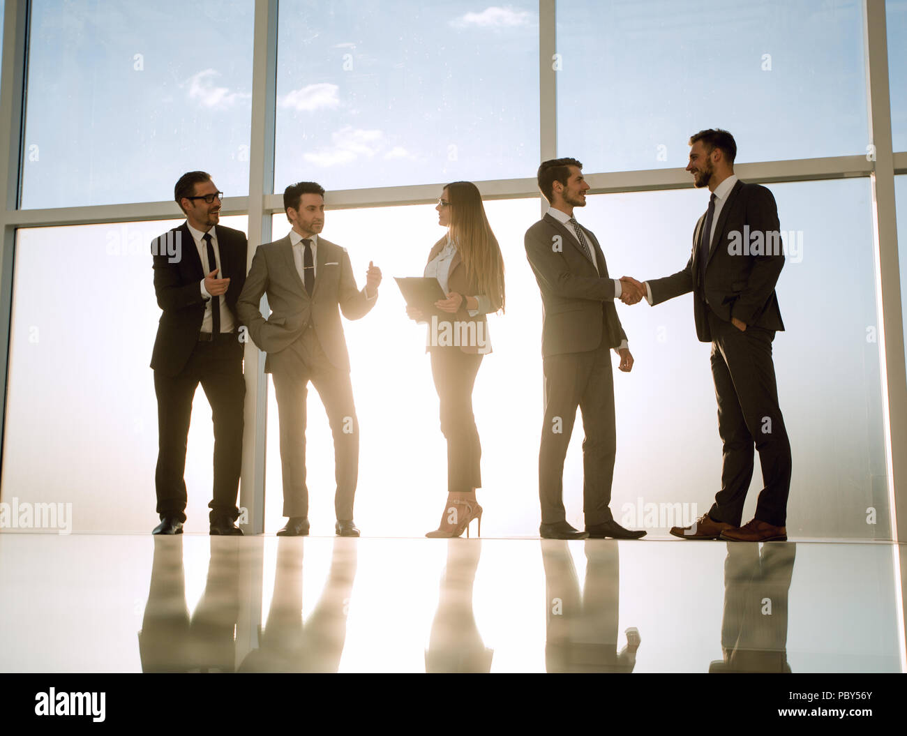 people walk in the office on the sunny background Stock Photo - Alamy
