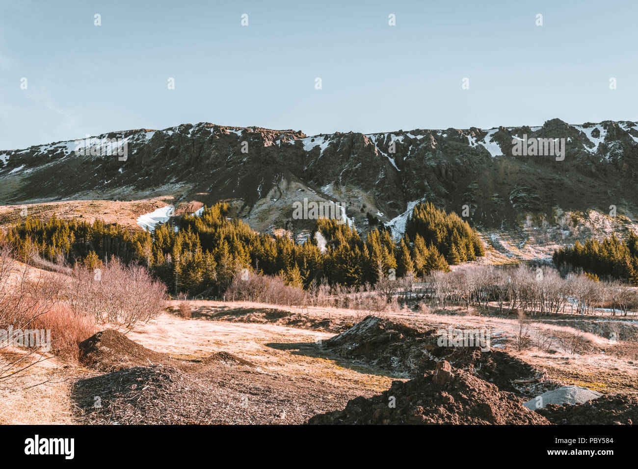 Boiling water and mud in the geothermal area Reykjadalur valley in ...