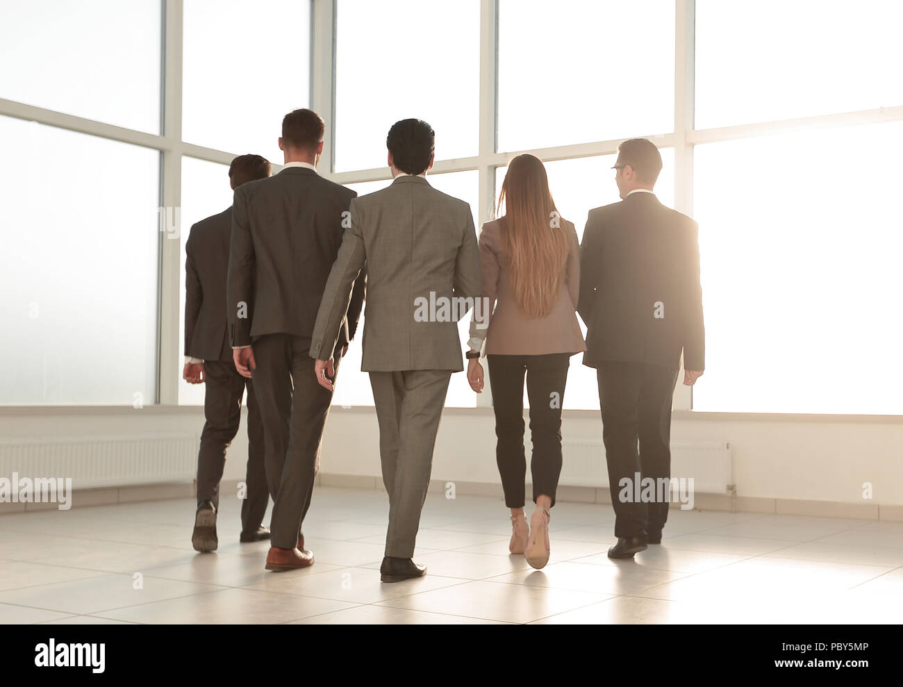 Rear view male executive talking hi-res stock photography and images ...