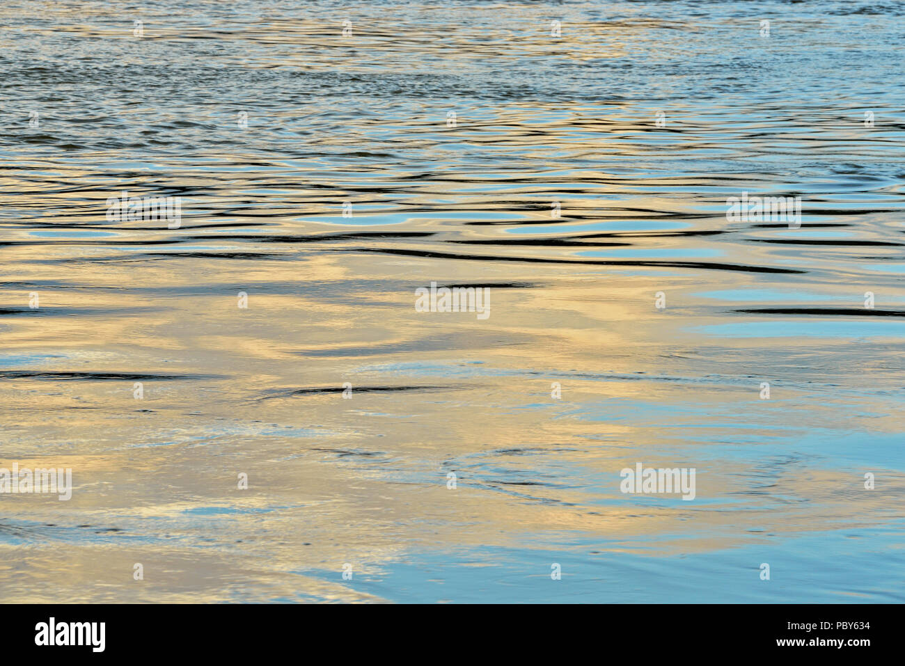 Evening sky reflections in the Slave River, Fort Smith, Northwest ...