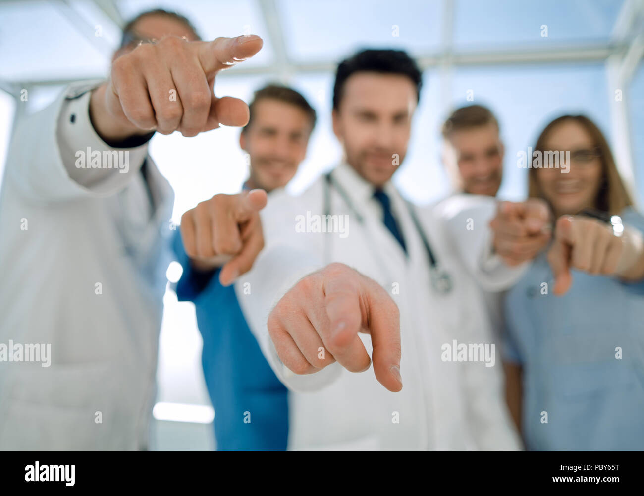 Doctor pointing viewer hi-res stock photography and images - Alamy