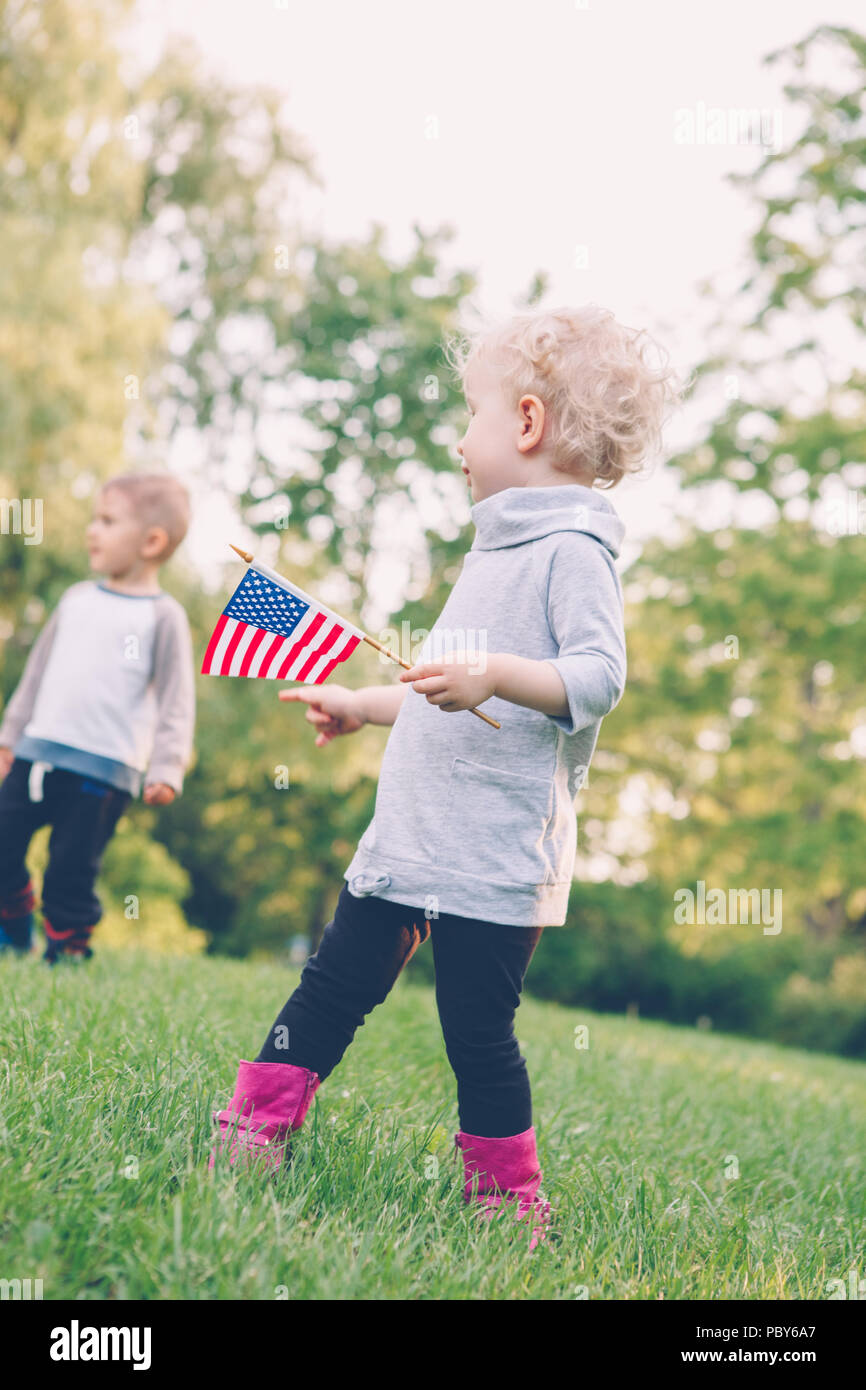 Children waving american flag hi-res stock photography and images - Alamy