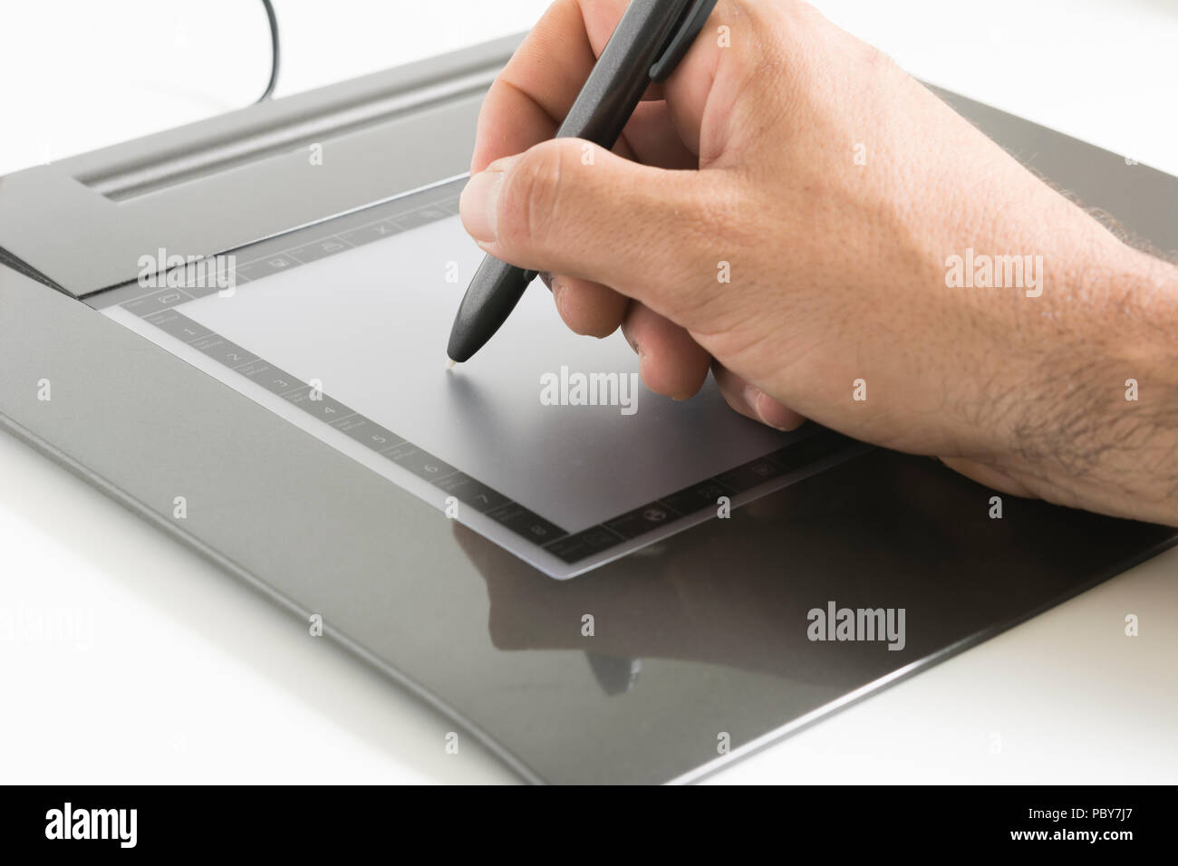 Hand drawing on a graphic tablet isolated on white background Stock ...