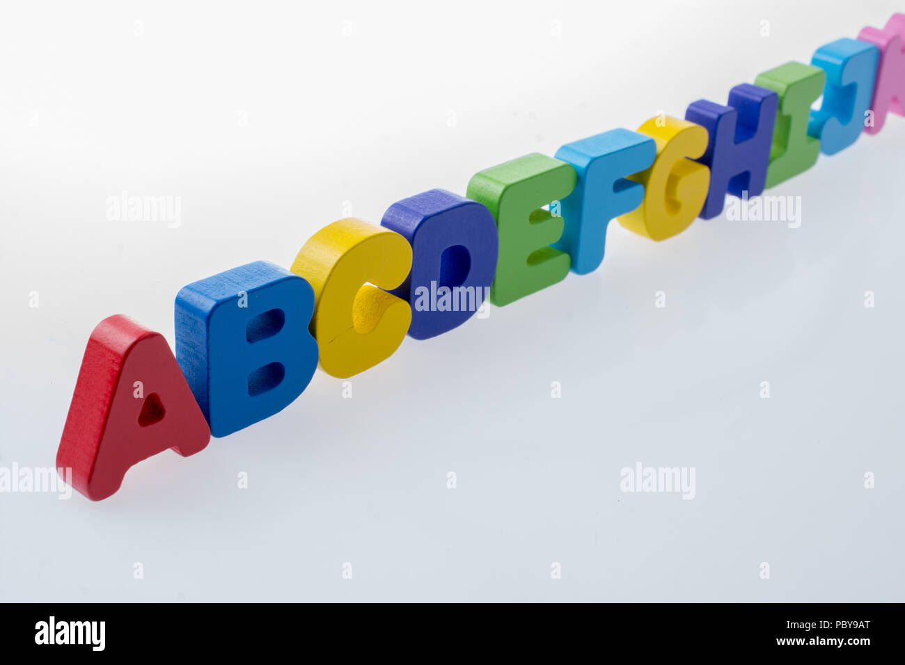 Letter cubes of Alphabet made of wood Stock Photo - Alamy