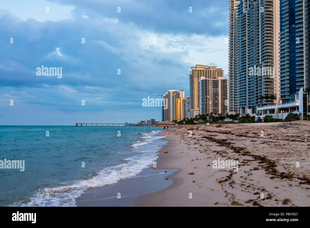 Sunny Isles Beach, USA - May 7, 2018: Apartment hotel buildings during ...