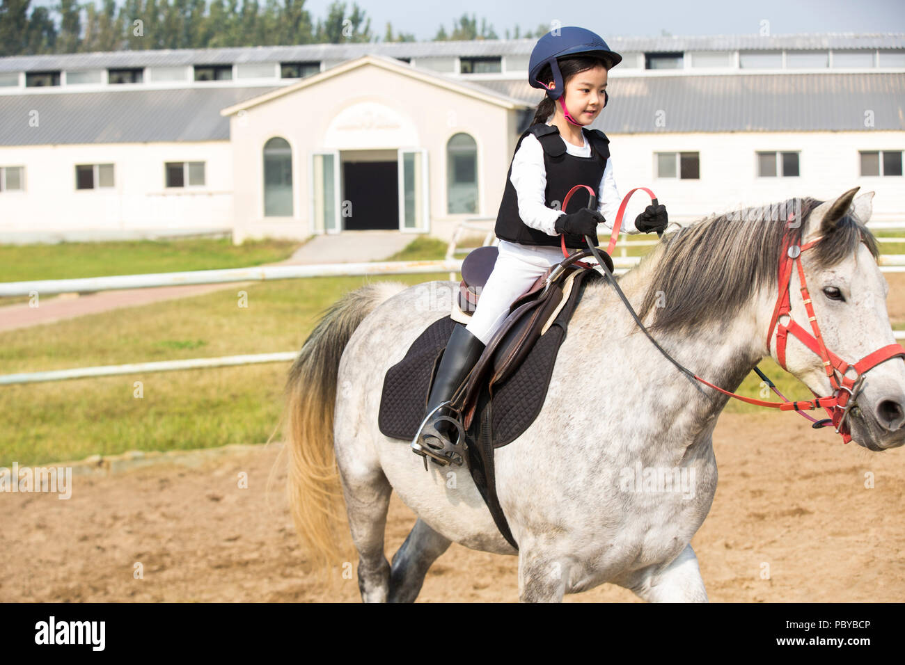 Chinese girl horse riding on hi-res stock photography and images - Alamy