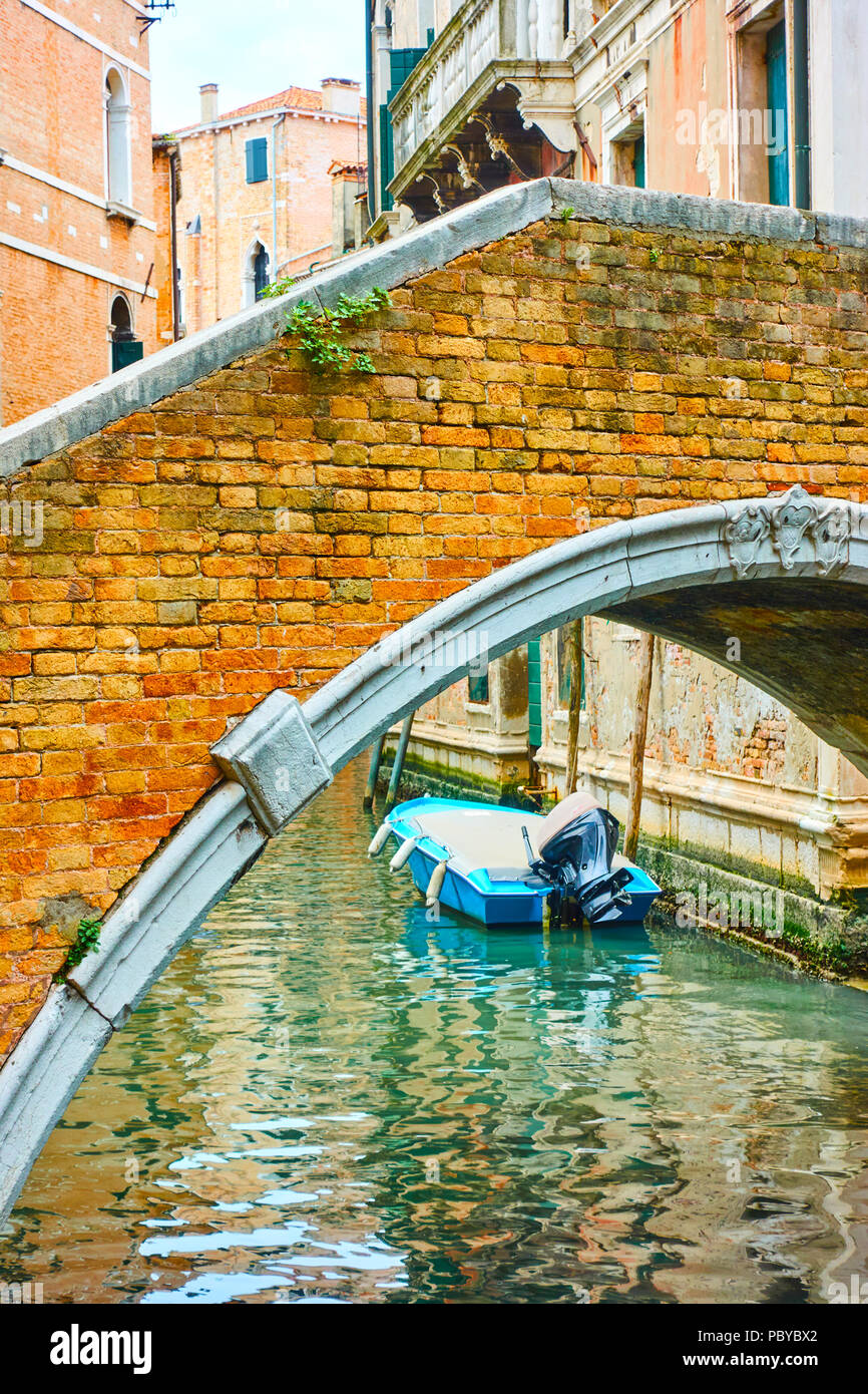 Old small arch bridge over canal in Venice, Italy Stock Photo - Alamy