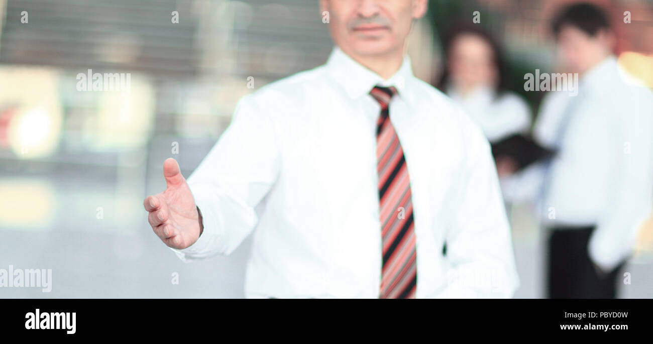 Man holding out hand shake hi-res stock photography and images - Alamy