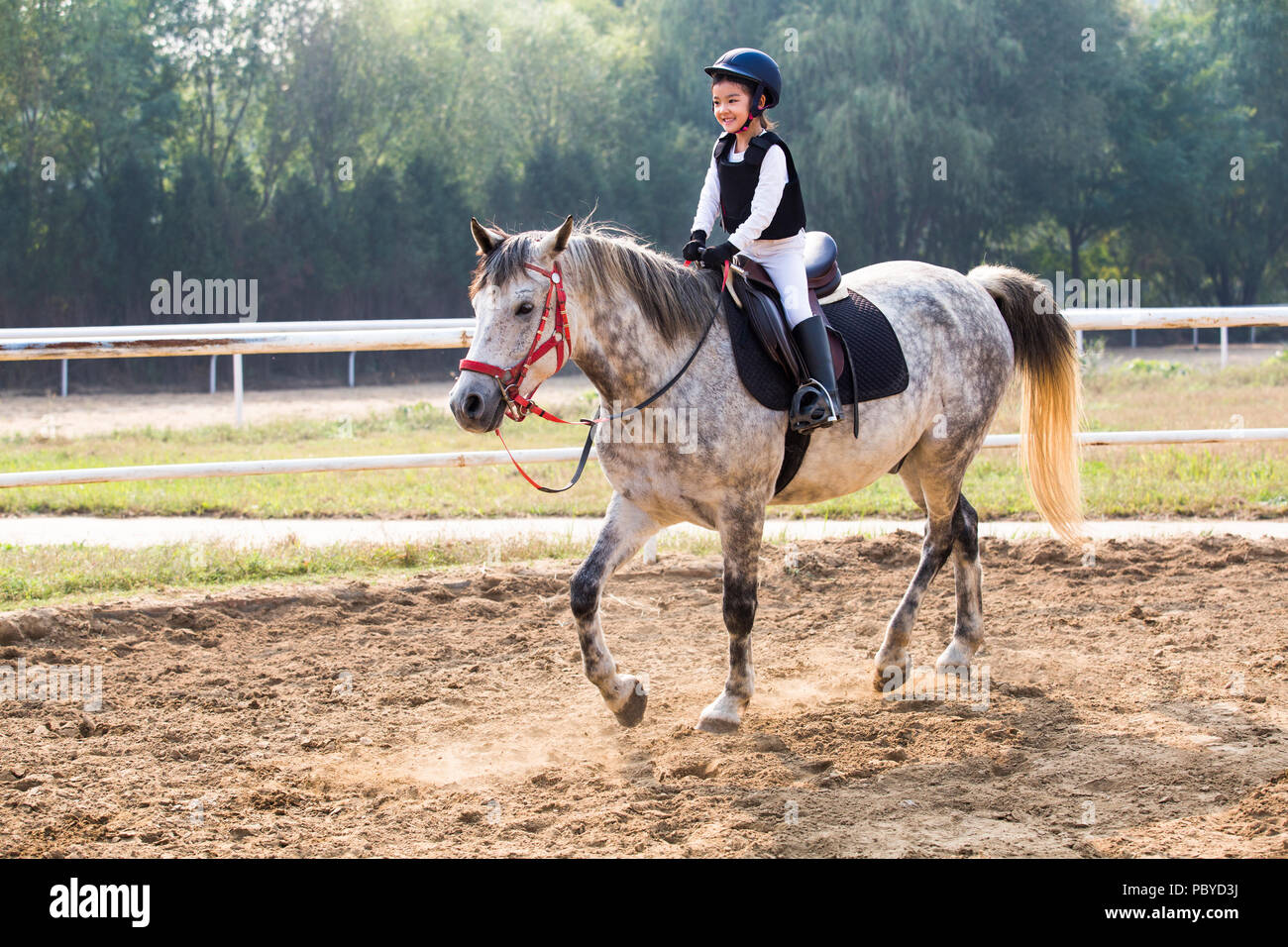 Chinese girl horse riding on hi-res stock photography and images - Alamy