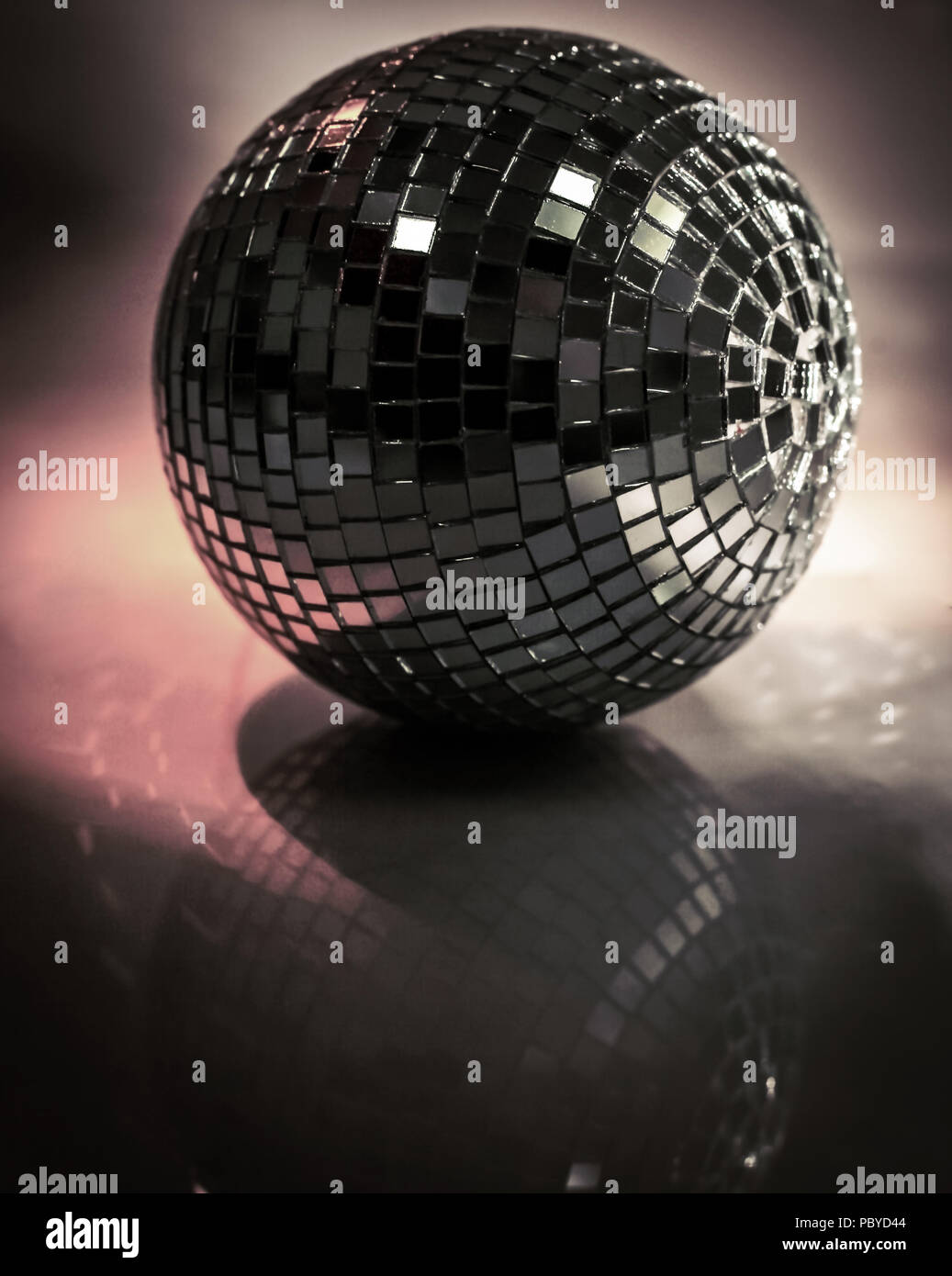 Mirrored shiny silver disco ball hi-res stock photography and images ...