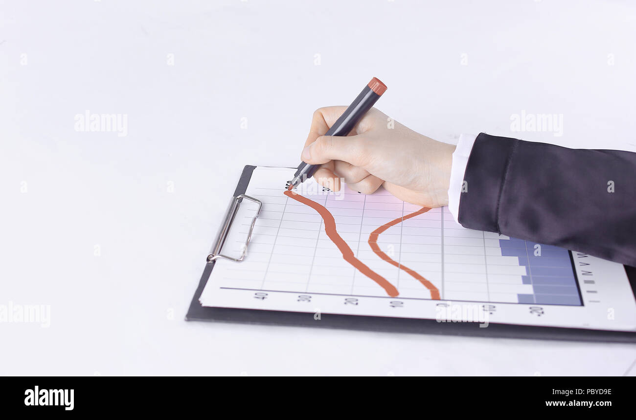 closeup .Businessman drawing a stock chart.isolated on white Stock ...