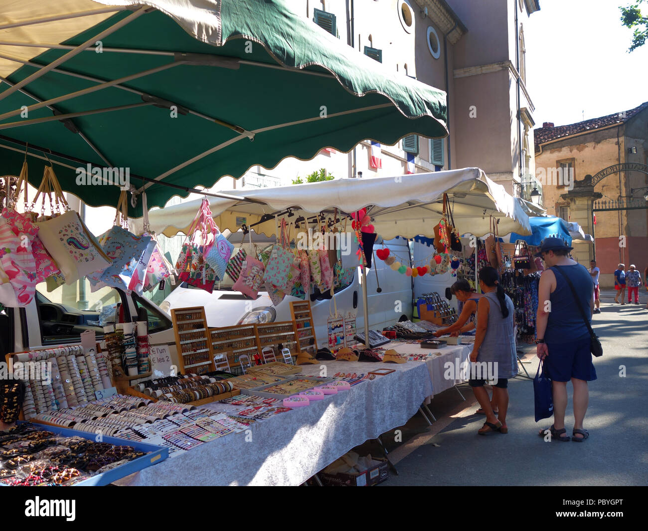 Colourful busy market at Saint Chinian french market Stock Photo - Alamy