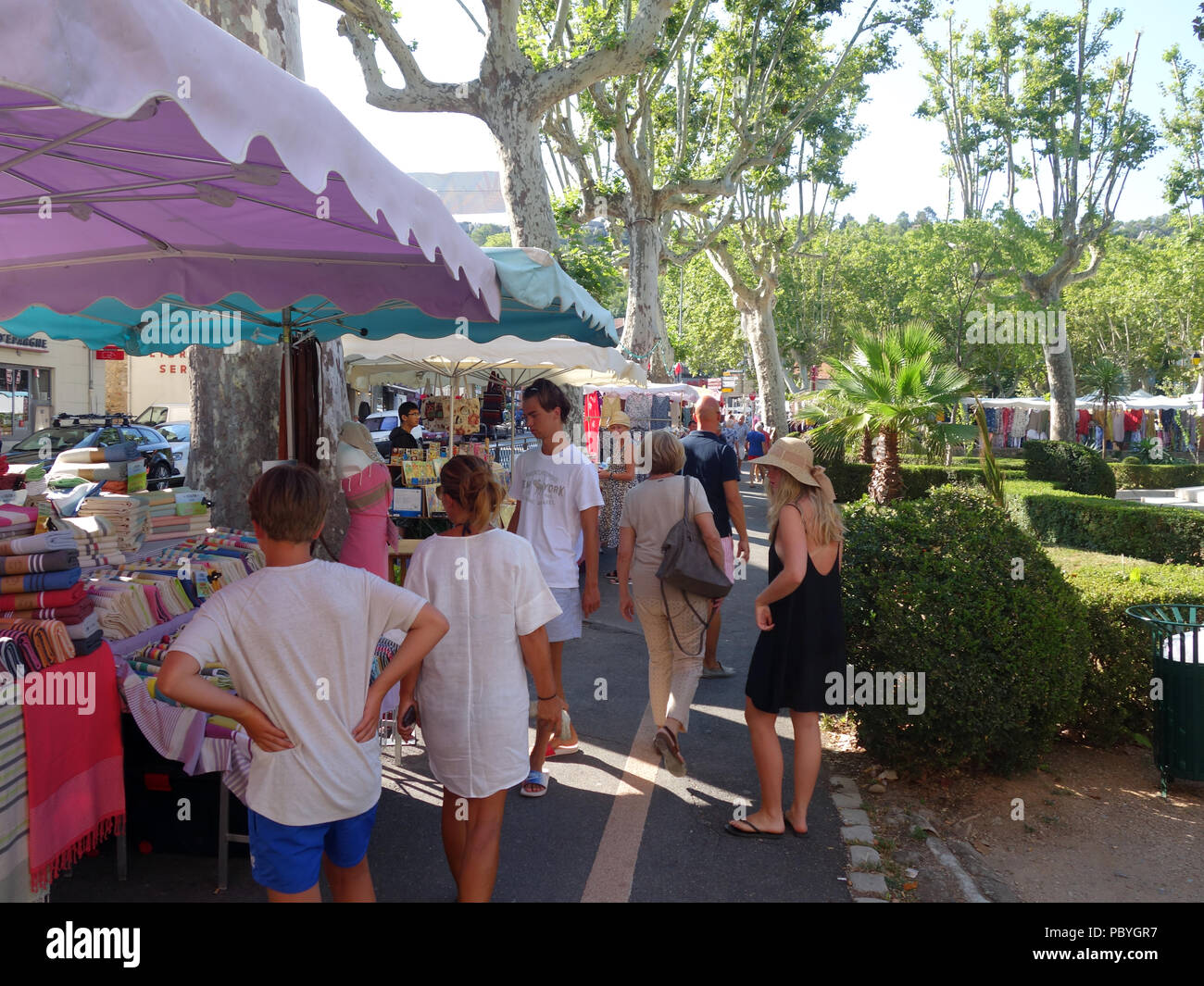 Colourful busy market at Saint Chinian french market Stock Photo - Alamy