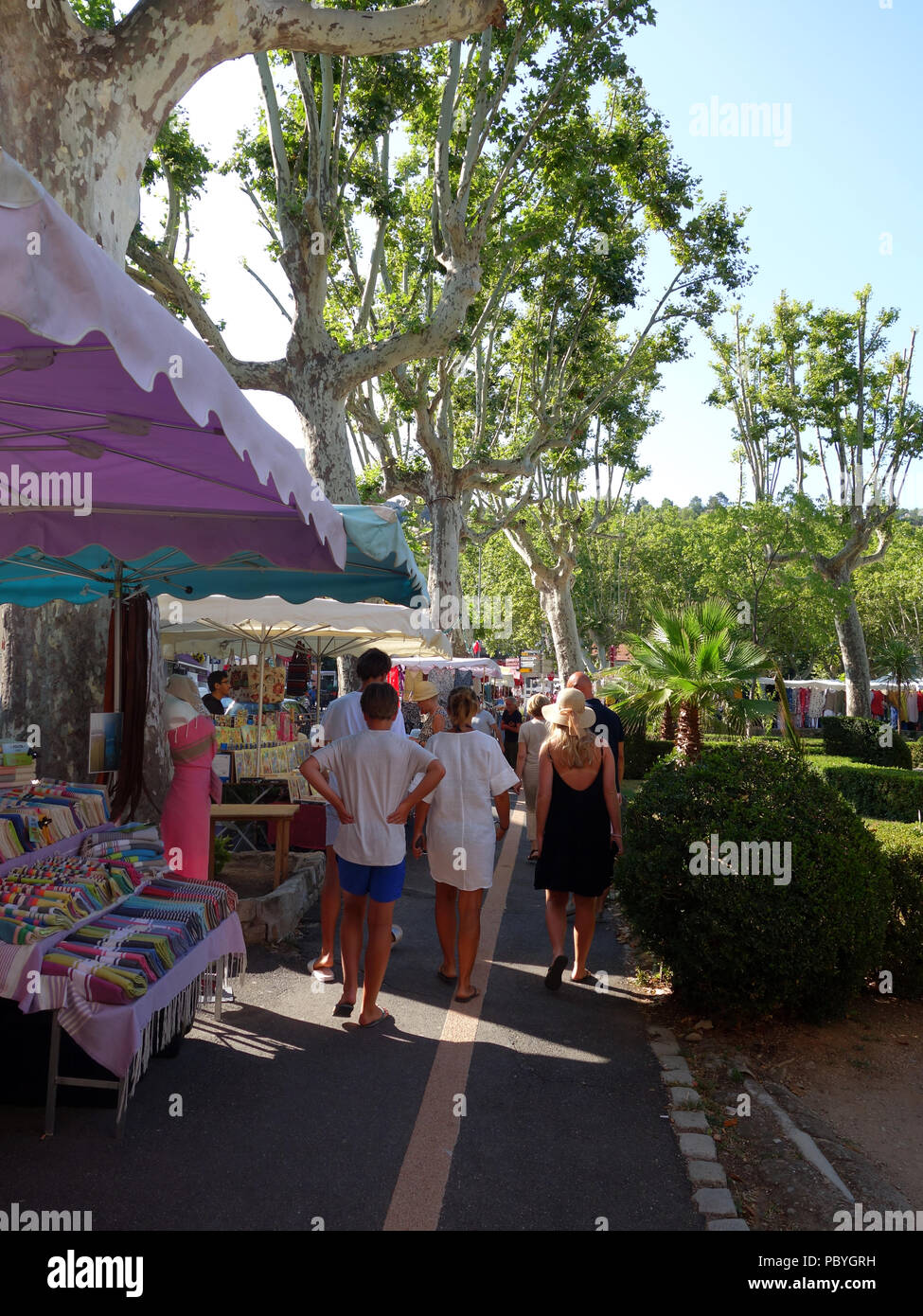 Colourful busy market at Saint Chinian french market Stock Photo - Alamy