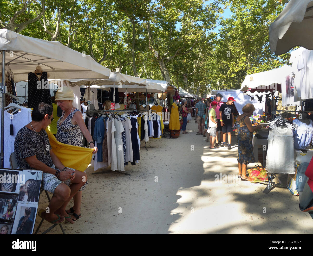 Colourful busy market at Saint Chinian french market Stock Photo - Alamy