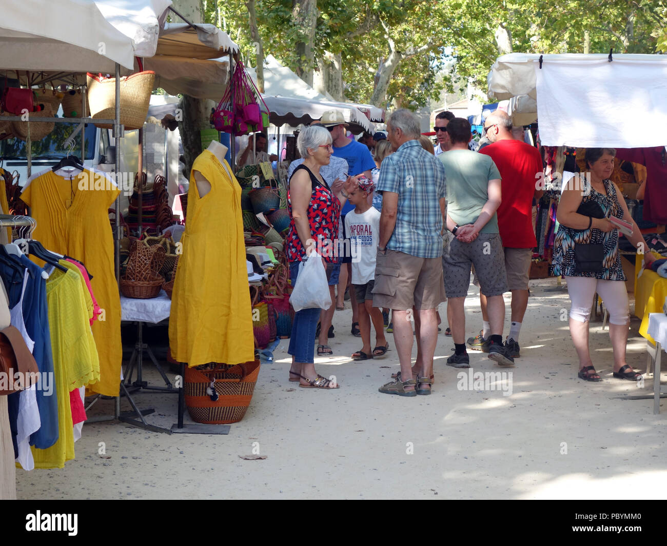 Colourful busy market at Saint Chinian french market Stock Photo - Alamy