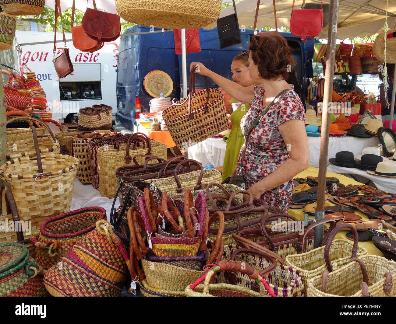 Colourful busy market at Saint Chinian french market Stock Photo - Alamy