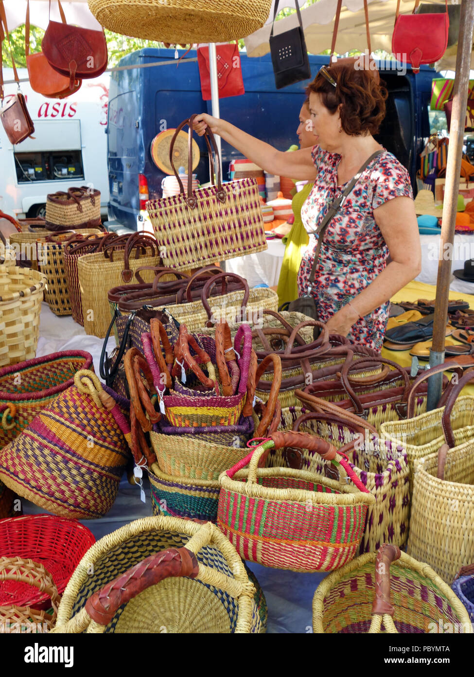 Colourful busy market at Saint Chinian french market Stock Photo - Alamy