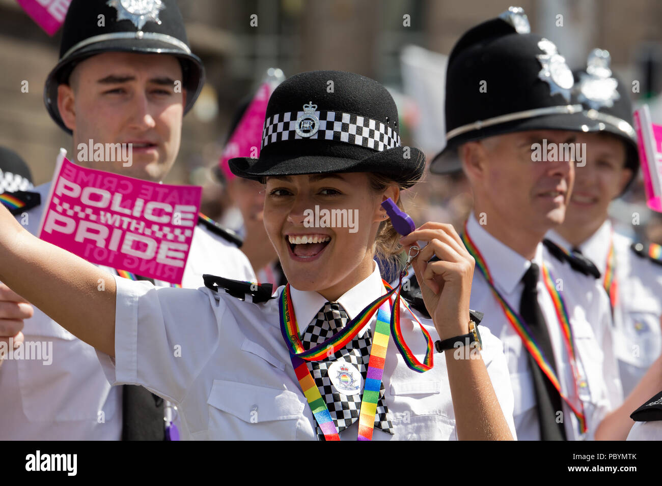 Officers from Merseyside Police force show their support for the LGBT ...